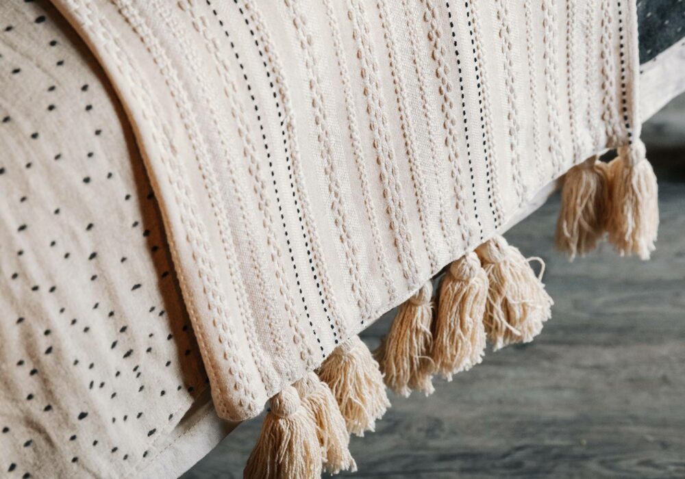 Malax Embroidered Ivory Throw | Natural Bed Company