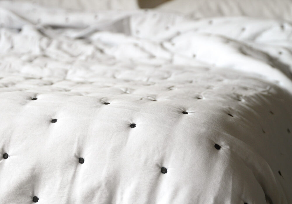 White Quilt with Ink Embroidered Detail | Natural Bed Company